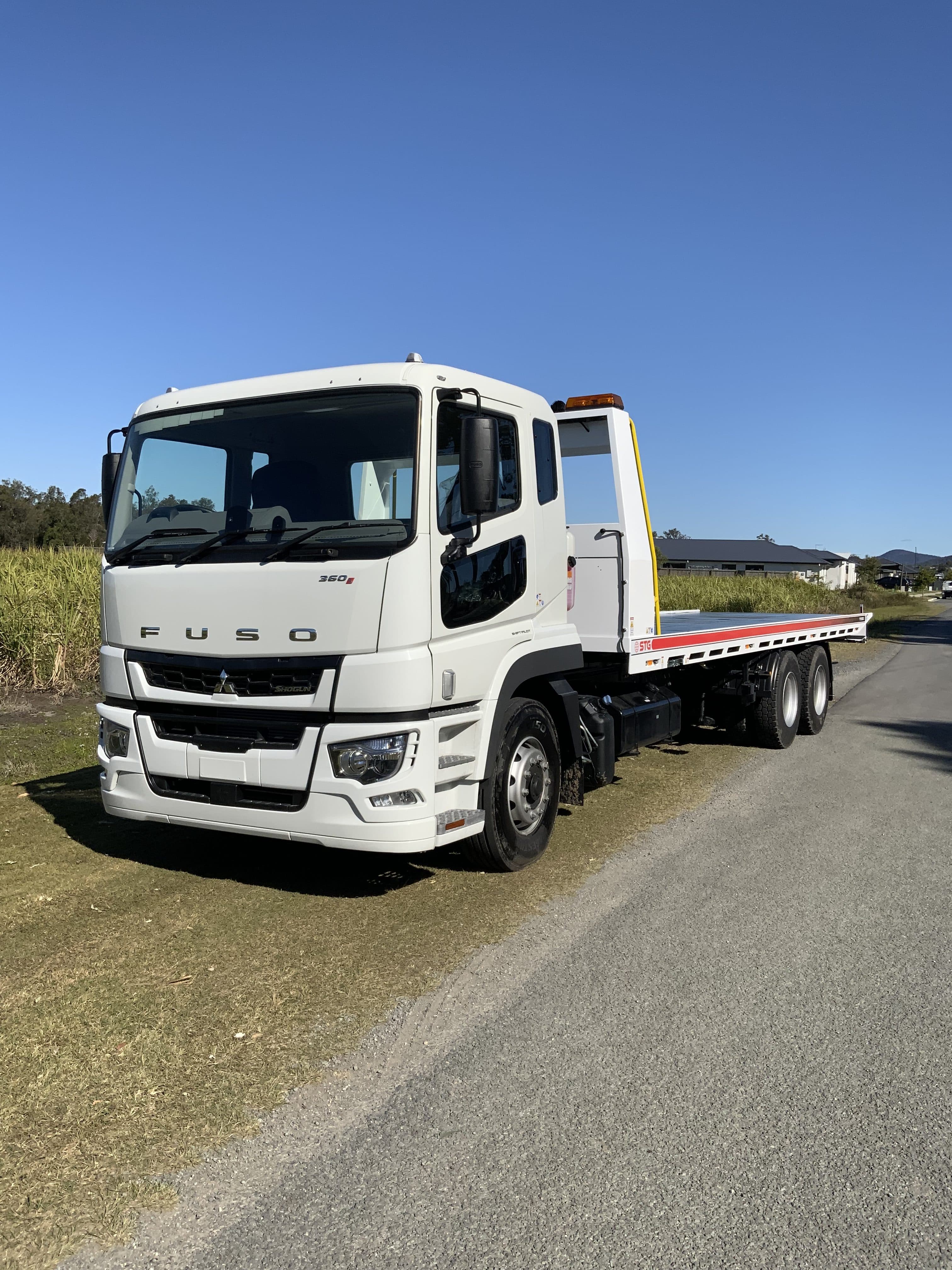 Tilt Tray Trucks for Sale - Tilt Tray Bodies | STG Global